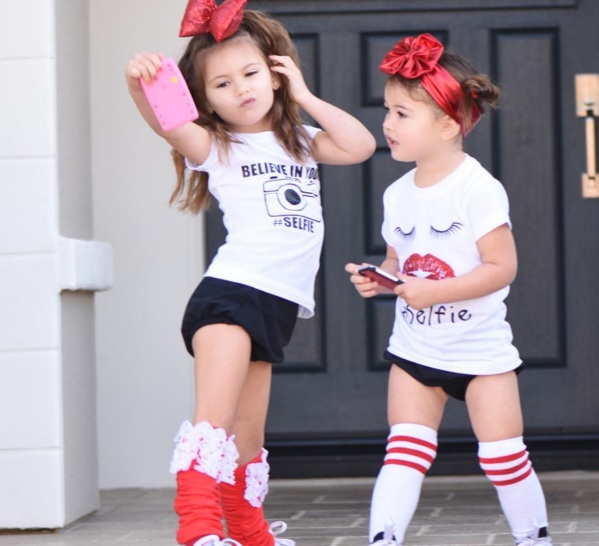 These tiny fashionista sisters will give celebrities a run for their money