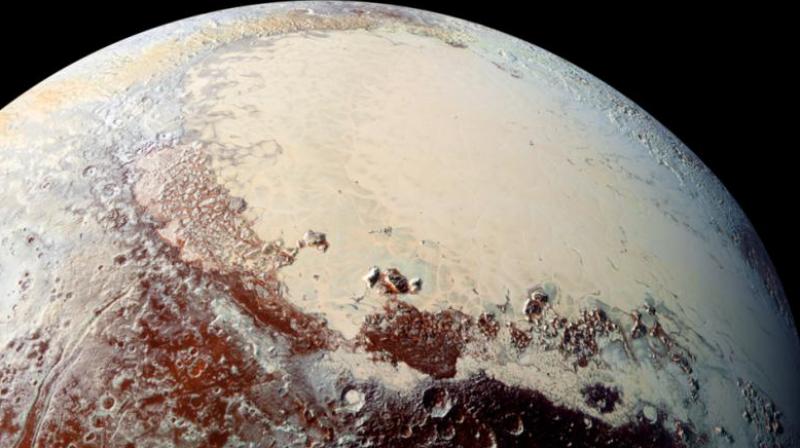 NASA probe captures Pluto in twilight | NASA probe captures Pluto in ...
