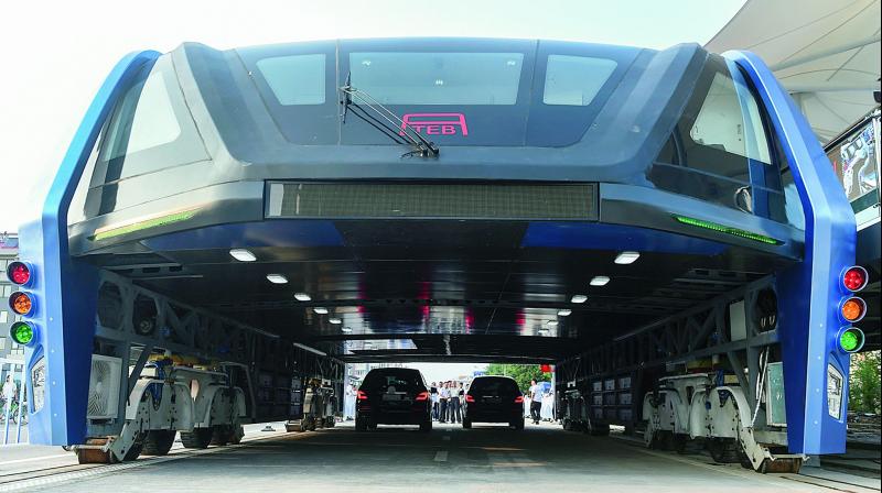 Futuristic straddling' bus on test-run | Futuristic straddling' bus on ...